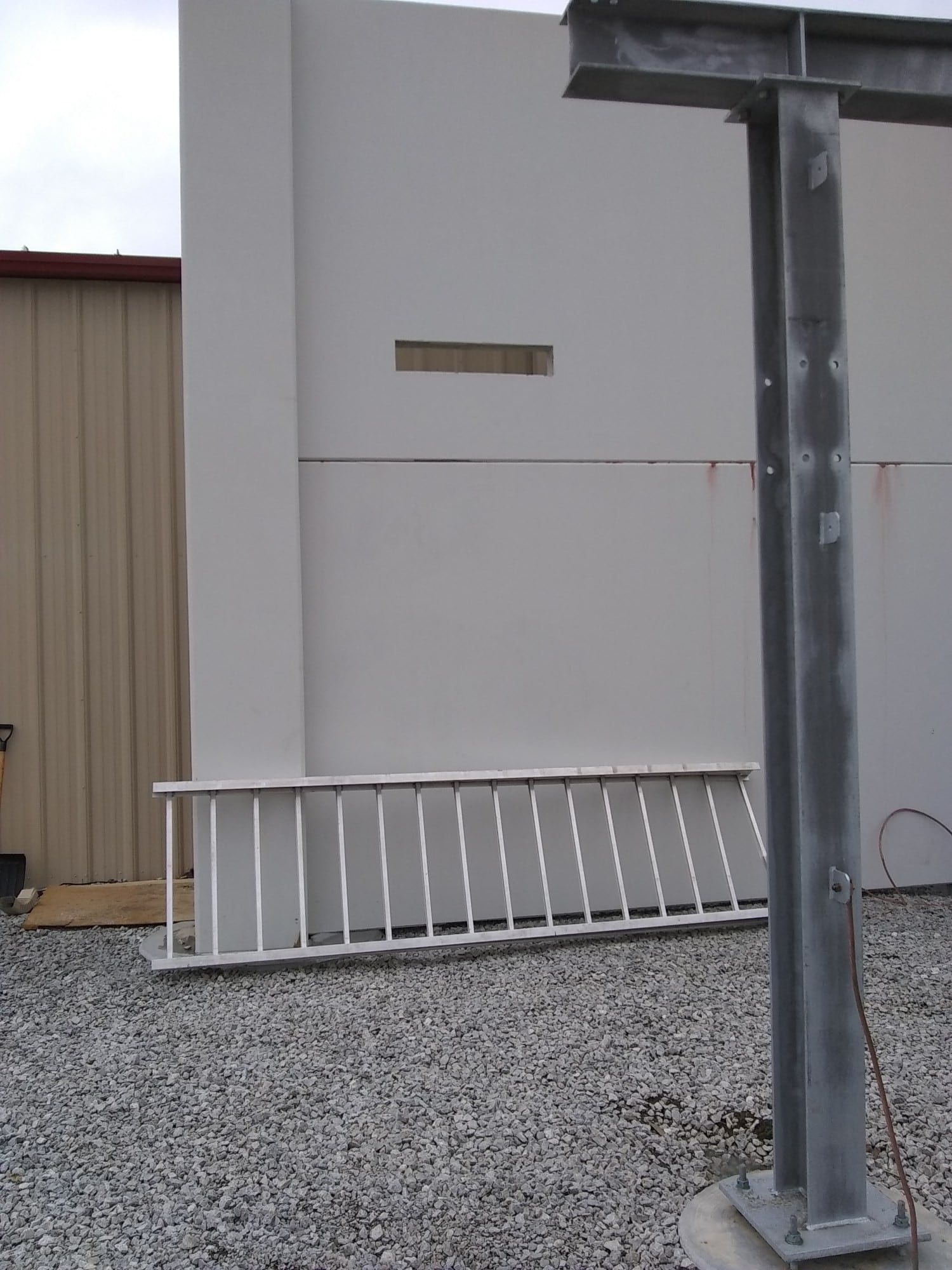 Firestopping a cable tray penetration through an exterior conc...